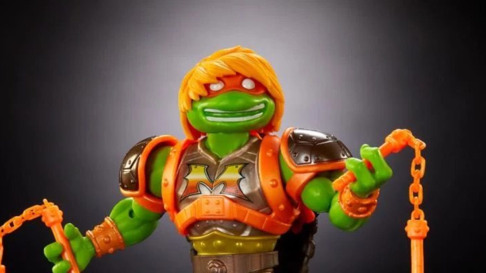 Mikey Shows Off His Inner He-Man with Mattel’s Turtles of Grayskull